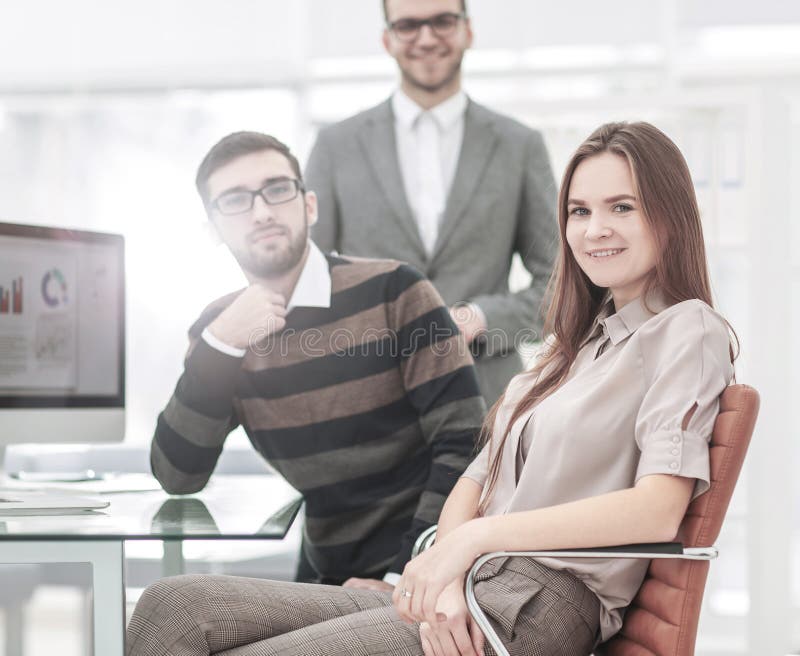 Group of Financial Experts Work with Financial Reports at the Workplace ...