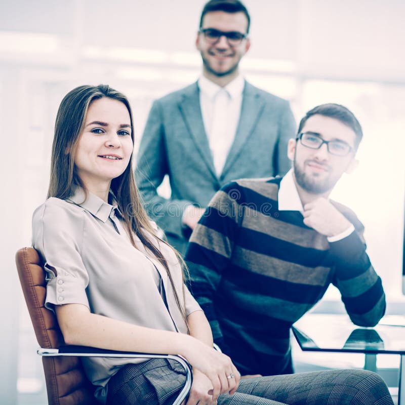 Group of Financial Experts Work with Financial Reports at the Workplace ...