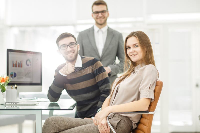 Group of Financial Experts Work with Financial Reports at the Workplace ...