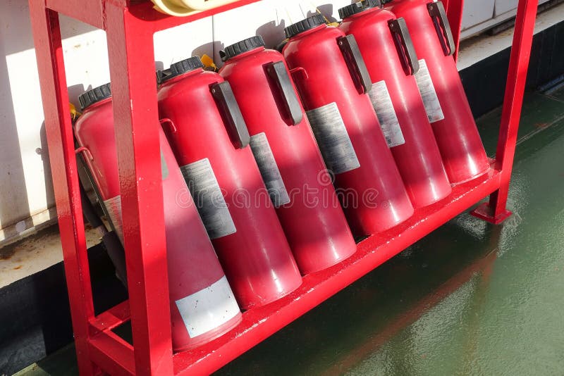 Group of Fire Extinguishers Arranged in a Row Stock Image - Image of ...