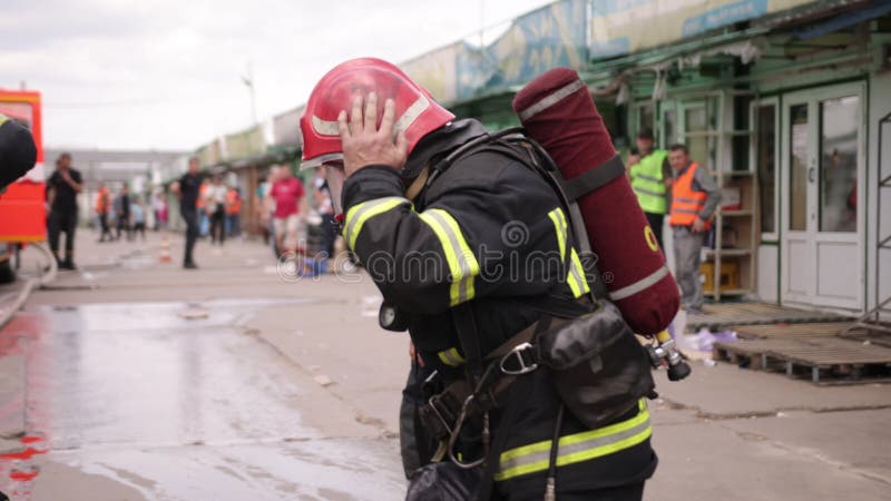 Group of Firefighters Preparing for Drill, Firefighter in Protective ...