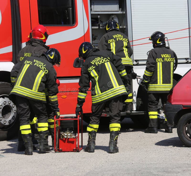 Group of Firefighters Working As a Perfect Teamwork Stock Photo - Image ...