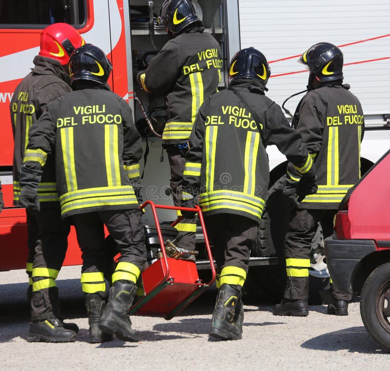 Group of Firefighters Working As a Perfect Teamwork Stock Photo - Image ...
