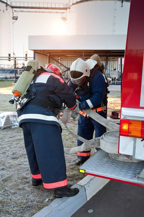 Group of Firemen Preparing for Extinguish Fire Stock Photo - Image of ...