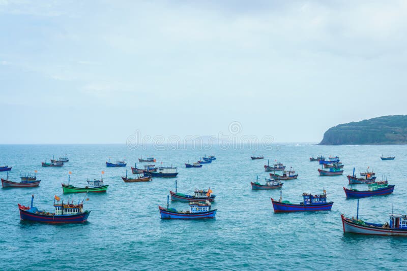 Group of fish boats on sea stock photo. Image of color - 56432506