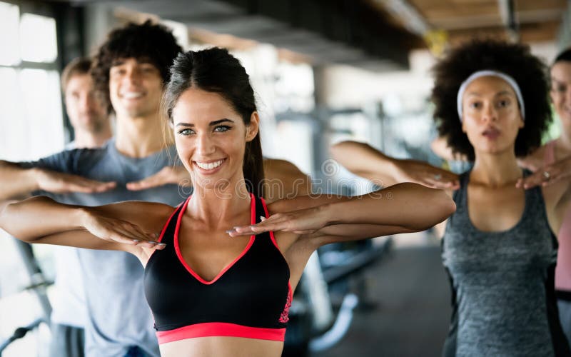 Group of Fit People at the Gym Exercising Stock Image - Image of ...