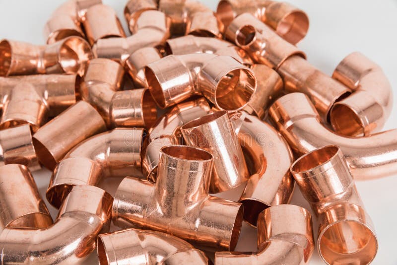 Group of Fittings on a White Background. Copper Fittings for Pipe ...