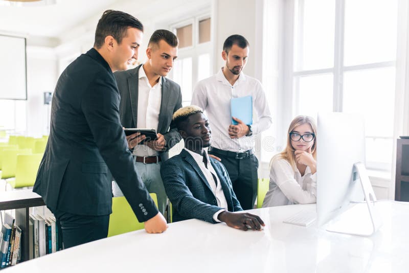 Group of Five Creative Worker Brainstorm Together in Office. New Style ...