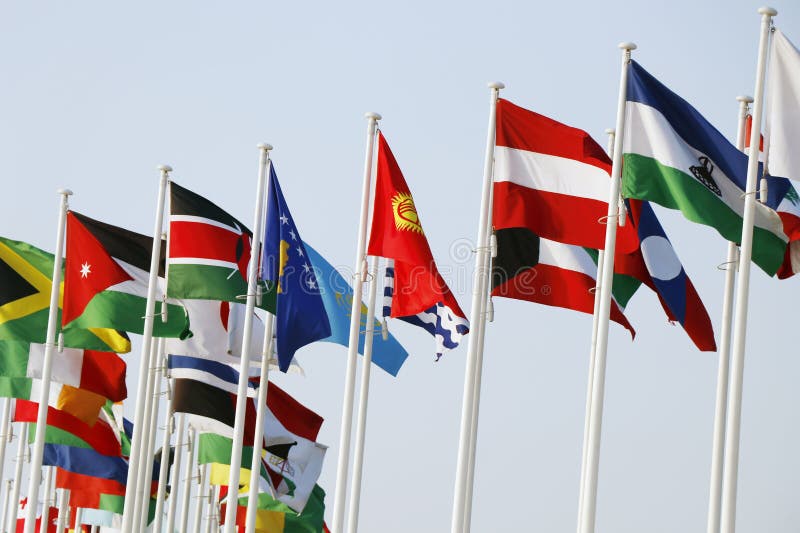 Group of Flags of Many Different Nations Against Blue Sky Stock Photo ...