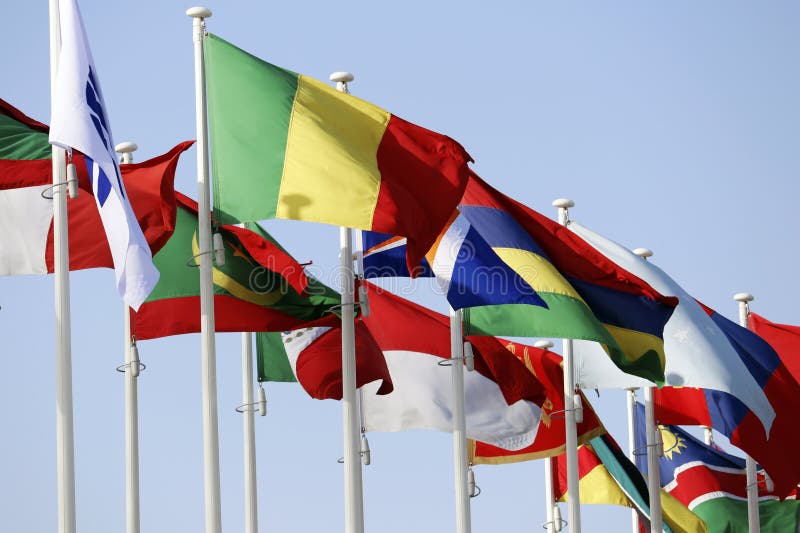 Group of Flags of Many Different Nations Against Blue Sky Stock Photo ...