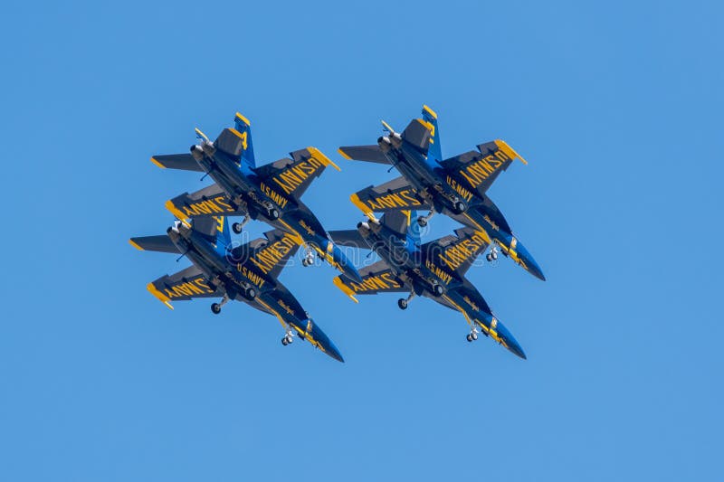 Group of Flying Aircraft Against a Blue Sky during an Airshow Editorial ...