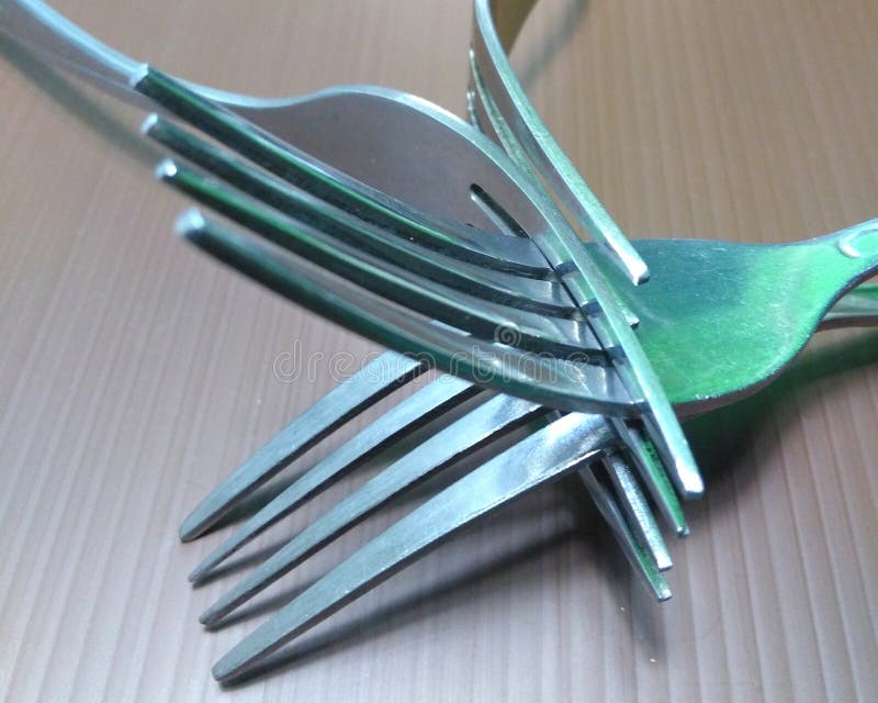 Group of forks on table stock image. Image of iron, shiny - 272921389