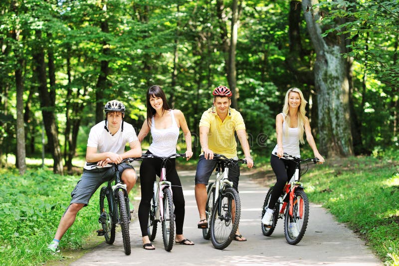 Group of Diverse Cyclists in the Forest Taking Picture Stock Image ...