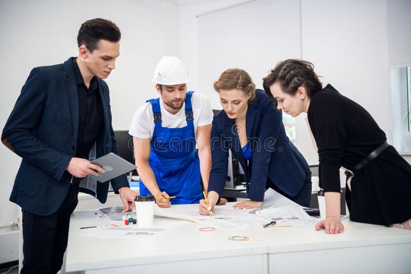 Group of Four Business People Working Together in Office Stock Image ...