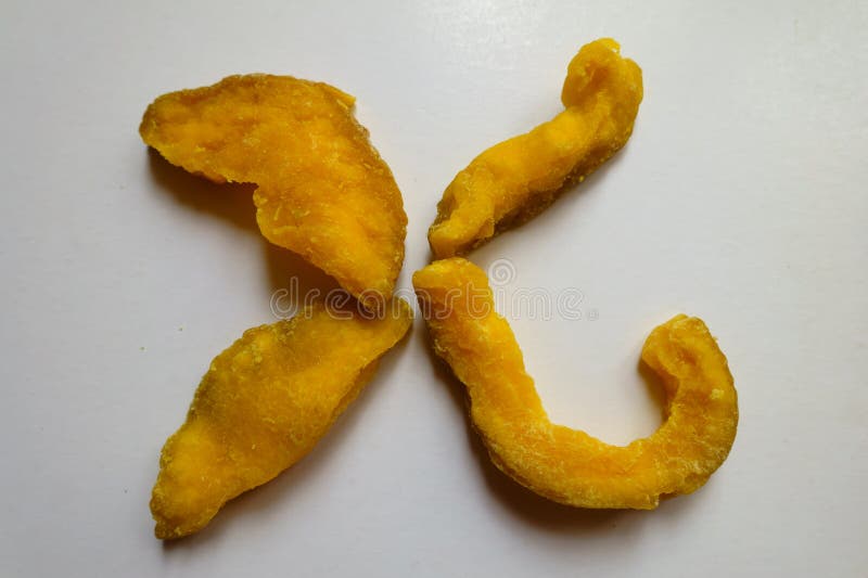 Group of Four Fleshy Yellow Dried Guava Slices Stock Image - Image of ...