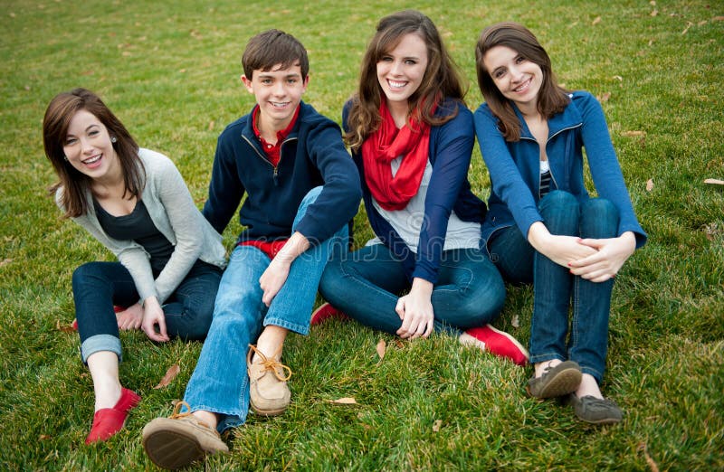 Group of Four Happy Teenagers Outside Stock Image - Image of school ...