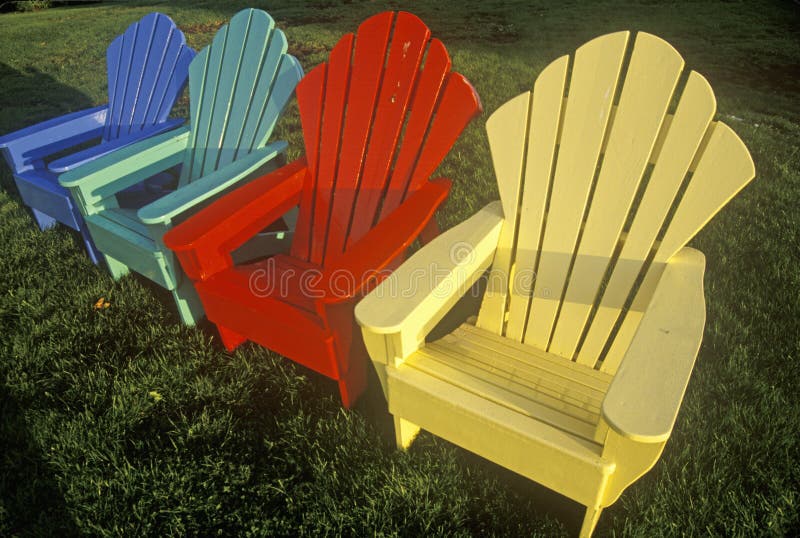 Group Of Four Multi Colored Chairs Stock Photo - Image of green, united ...
