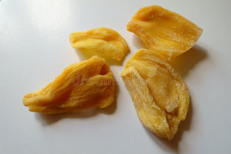 Group of Four Pieces of Yellow Dried Jack Fruit Stock Photo - Image of ...