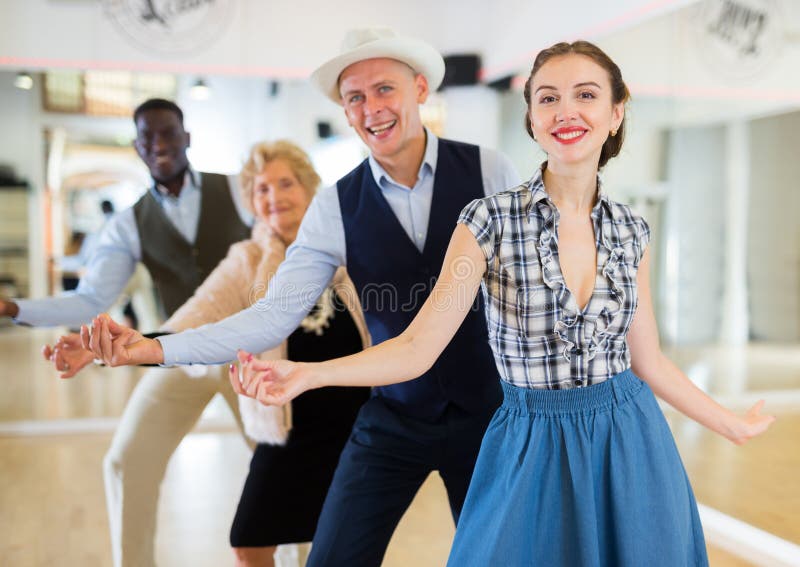 Men and Women Swing Dancers Flicking Stock Image - Image of kenyan ...