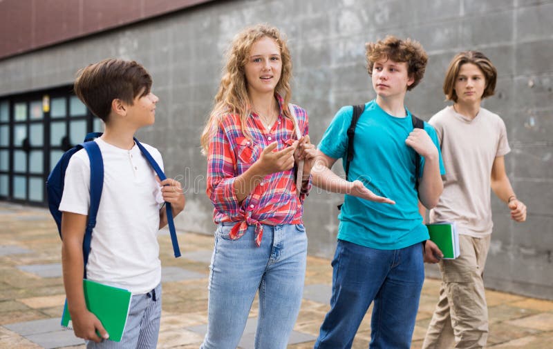 Group of Four Teens Going Home from School Stock Photo - Image of ...