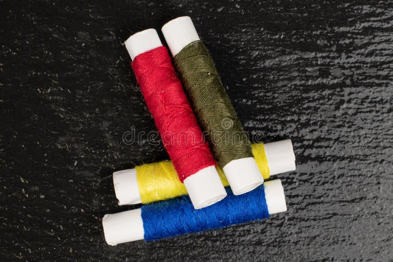 Sewing Thread Spool on Grey Stone Stock Photo - Image of pair, couple ...