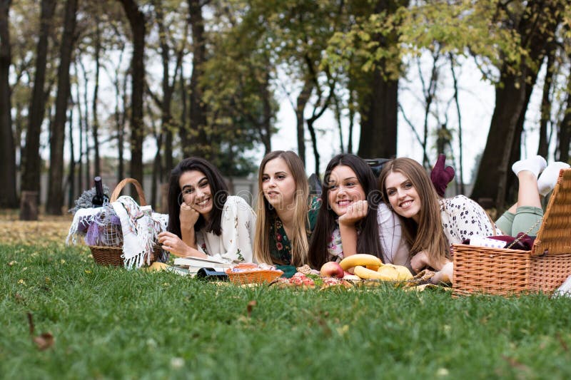 Group of Young Women Out on a Fun Picnic in the Park Stock Photo ... Group of Young Women Out on a Fun Picnic in the Park Stock Photo ...