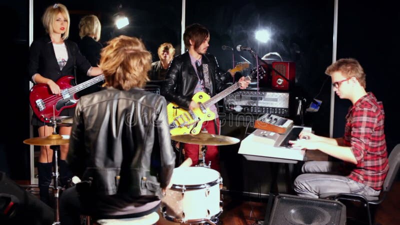 Group of Four Young Musicians Plays in Studio with Stock Footage ...