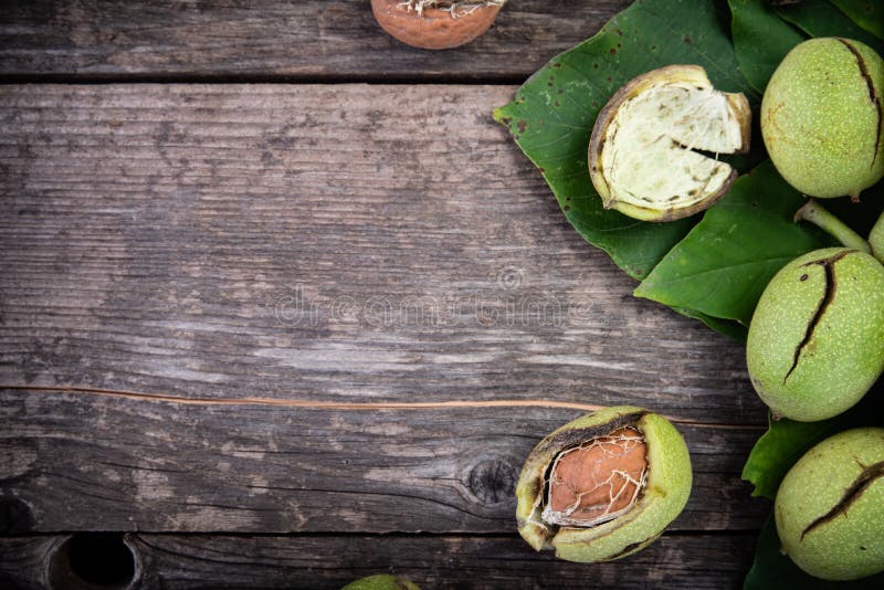 Group of Fresh Green Walnuts on Wooden Table, Top View Stock Image ...