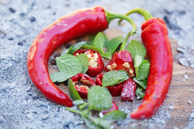 Group of Fresh Red Hot Chilli Peppers on an Old Vintage Wooden Table ...