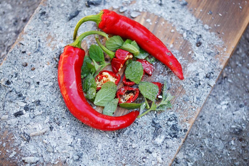 Group of Fresh Red Hot Chilli Peppers on an Old Vintage Wooden Table ...