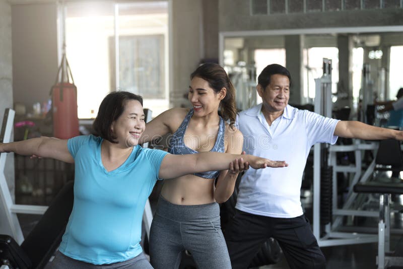 Group Of Friend Asian Senior Stretching Exercise At Yoga Gym Elderly