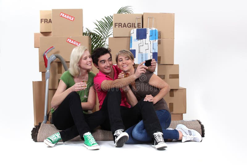 Friends moving in together stock photo. Image of residence - 29642302