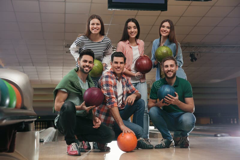 Group of Friends with Balls in Bowling Stock Photo - Image of enjoy ...