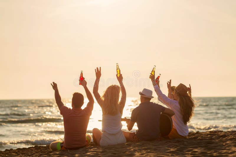 Group of Friends on the Beach Play Stock Photo - Image of happiness ...