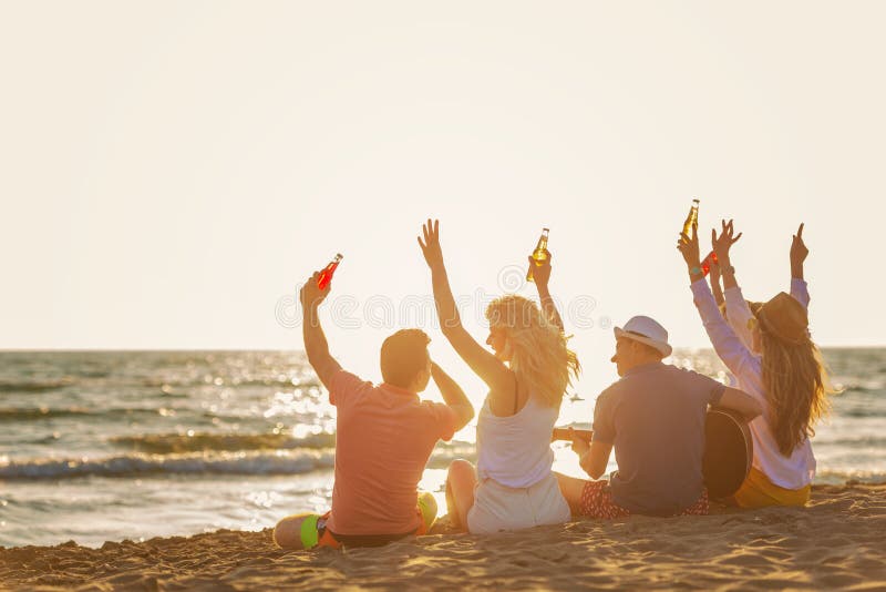 Group of Friends Play on the Beach Stock Image - Image of holiday ...