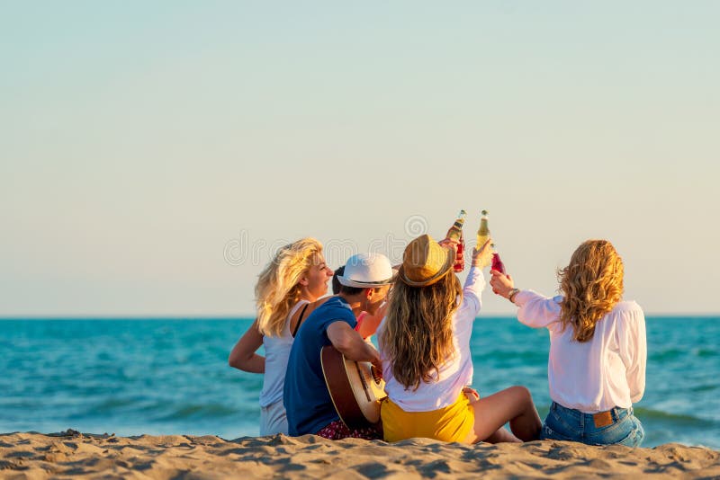 Group of Friends Play on the Beach Stock Image - Image of freedom ...