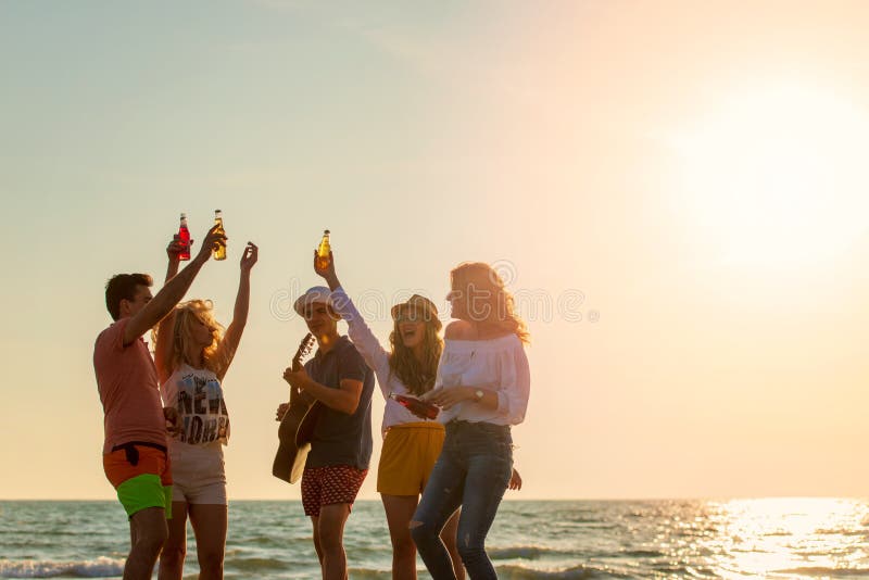 Group of Friends Play on the Beach Stock Image - Image of couple ...