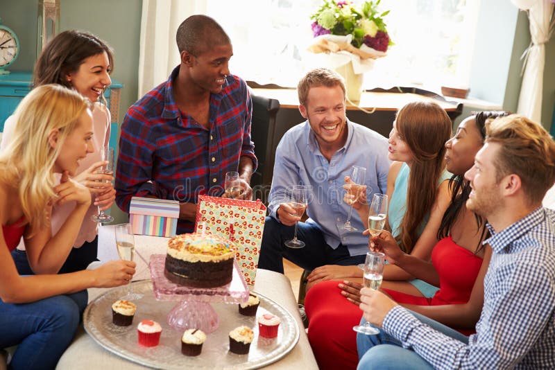 Group of Friends Celebrating Birthday at Home Together Stock Photo ...