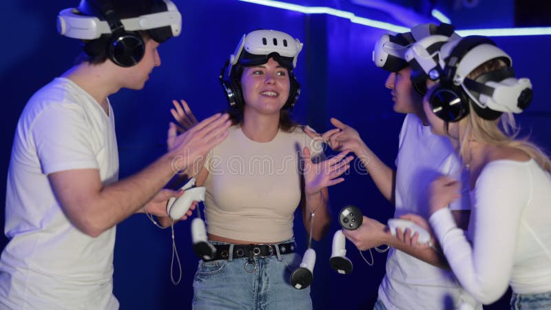 Group of Friends Chat Animatedly after Playing Virtual Reality Stock ...