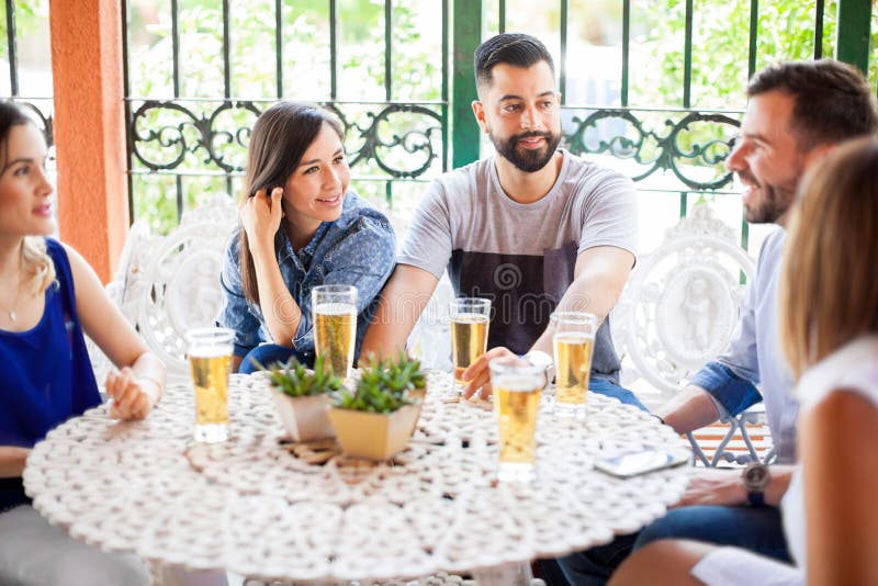 Group of Friends Chating and Drinking Stock Image - Image of male ...