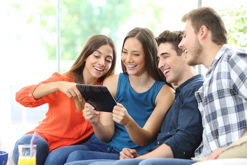 Group of Friends Checking Tablet Content at Home Stock Photo - Image of ...
