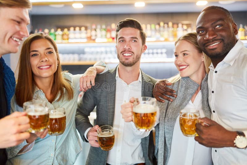 Group of Friends Drinking Beer in Pub or Bar Stock Photo - Image of ...
