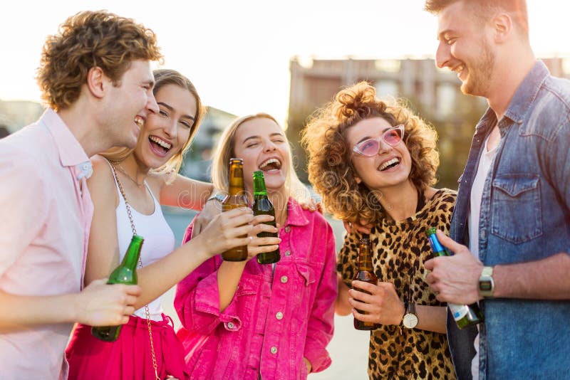 Group of Friends Drinking Beer Together Stock Image - Image of five ...