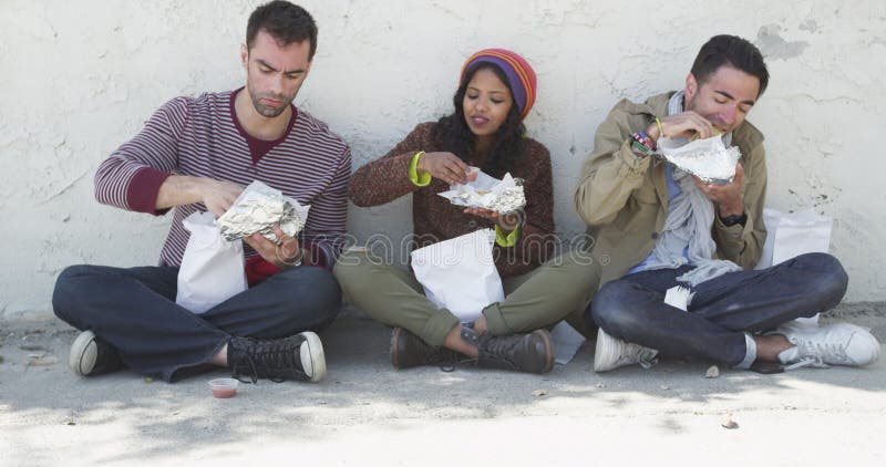 Group of Friends Eating Fast Food Together Stock Footage - Video of ...