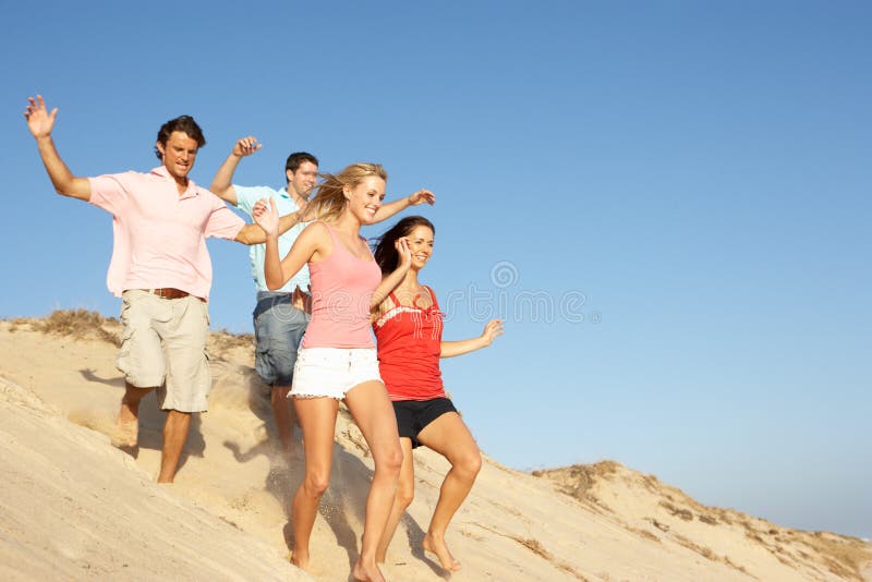 Group of Friends Enjoying Beach Stock Photo - Image of couple, beach ...