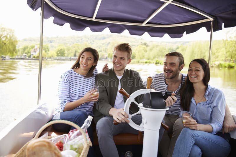 Family Enjoying Day Out in Boat on River Together Stock Image - Image ...