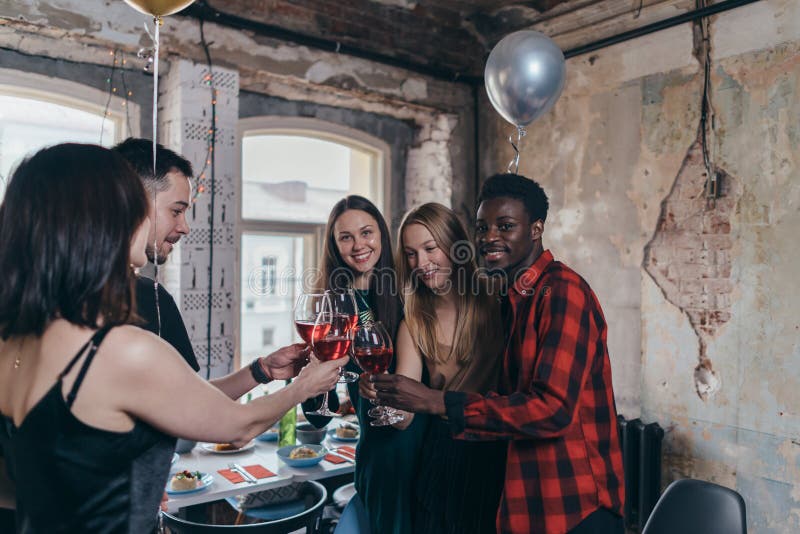 Group of Friends Enjoying Drinks in Bar. Stock Image - Image of ...