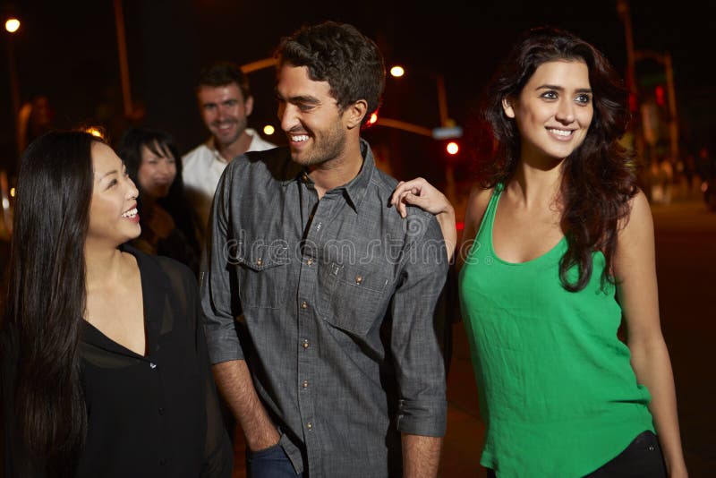 Group of Friends Enjoying Night Out Together Stock Image - Image of ...