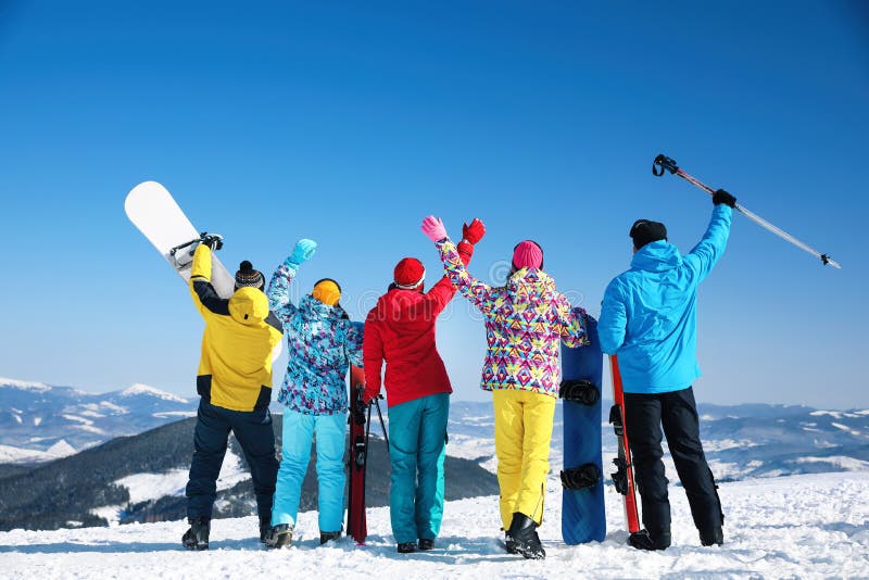 Group of Friends with Equipment at Ski Resort. Winter Vacation Stock ...