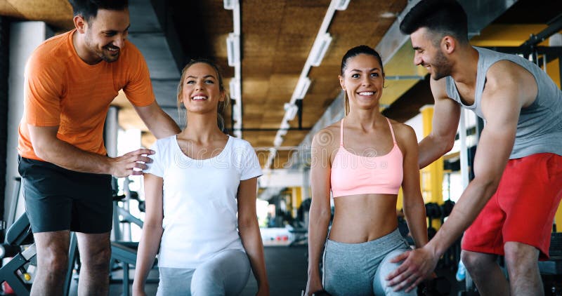 Group of Friends Exercising Together in Gym Stock Photo - Image of ...